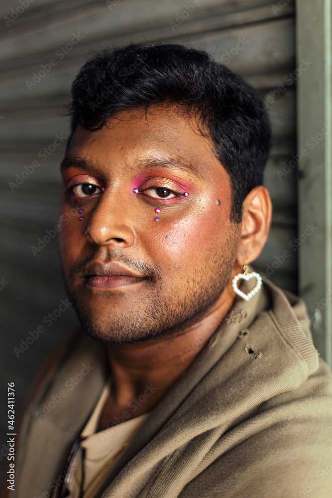 portrait of dark skinned Indian man in Malaysia, with theatrical facial ...
