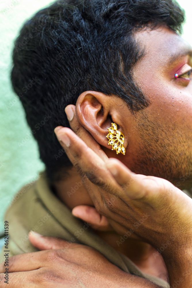 portrait of dark skinned Indian man in Malaysia, with theatrical facial ...