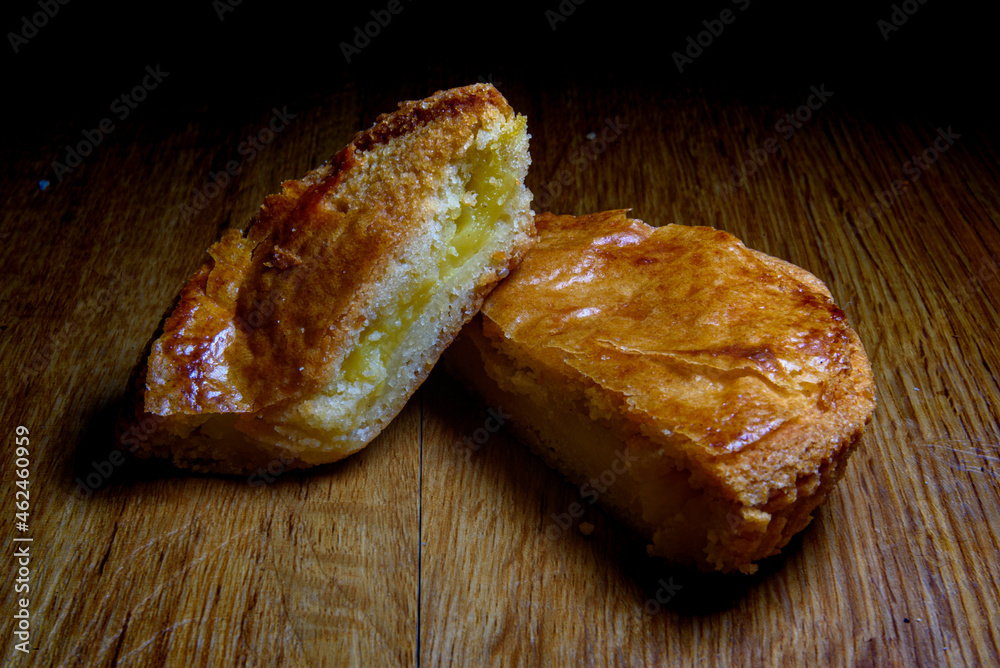 two halves of a cupcake, sponge cake and custard, Basque cake, gateau ...