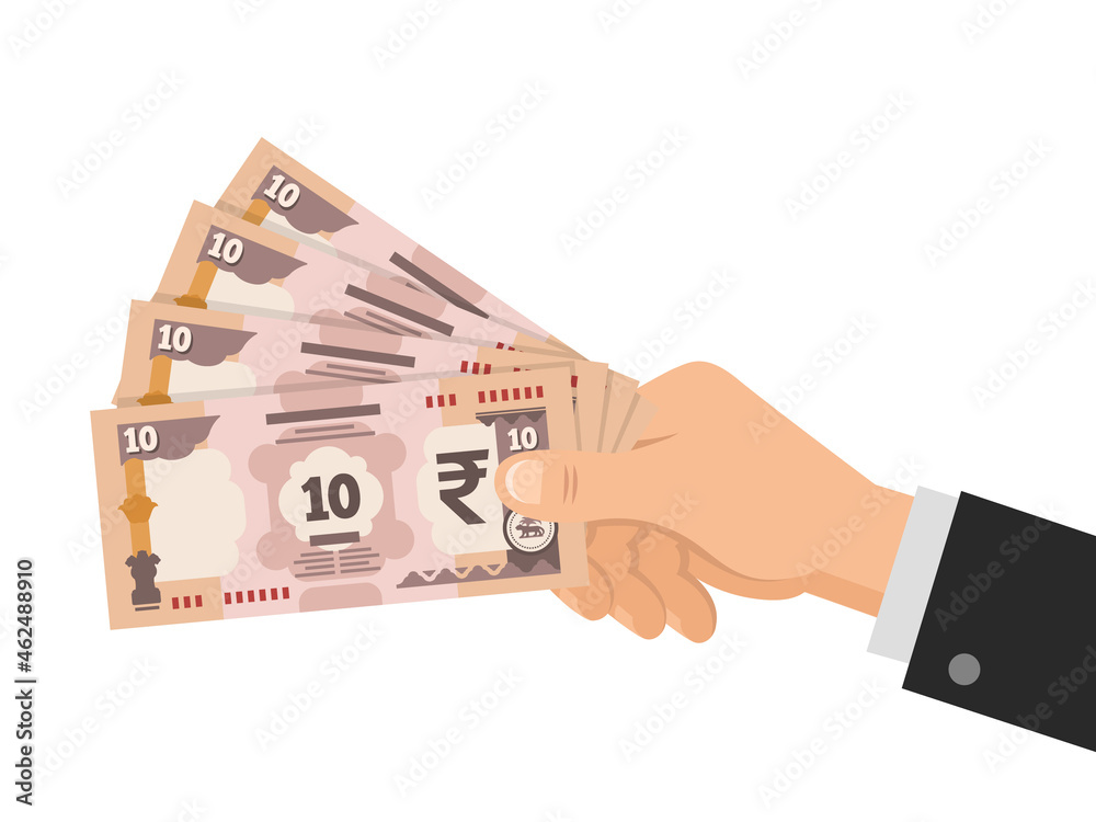 Hand holds money Indian Rupee 10 banknotes. Business concept. Official ...