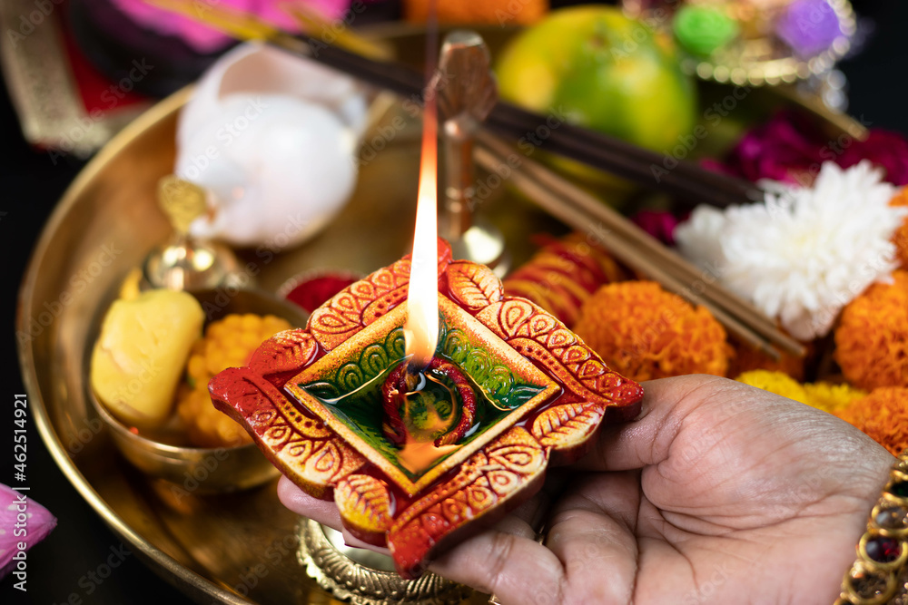Hands Of Girl In Bangles Holding Clay Diya Deep Dia Lamp Illuminated ...