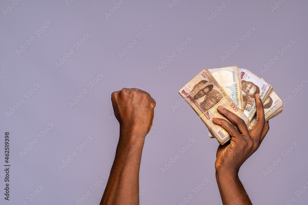 Black Hands Holding Money