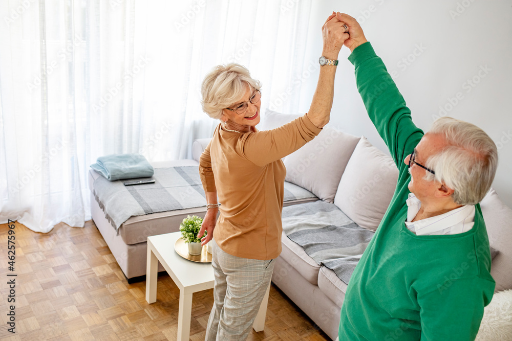 An elderly couple is dancing together. Older woman dancing with man ...