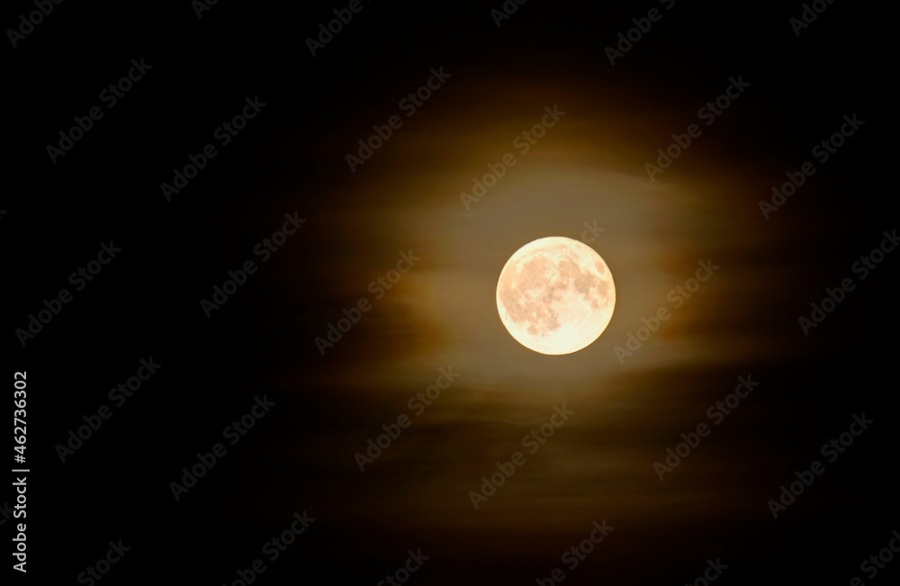 Germany, Full moon glowing against night sky Stock Photo | Adobe Stock
