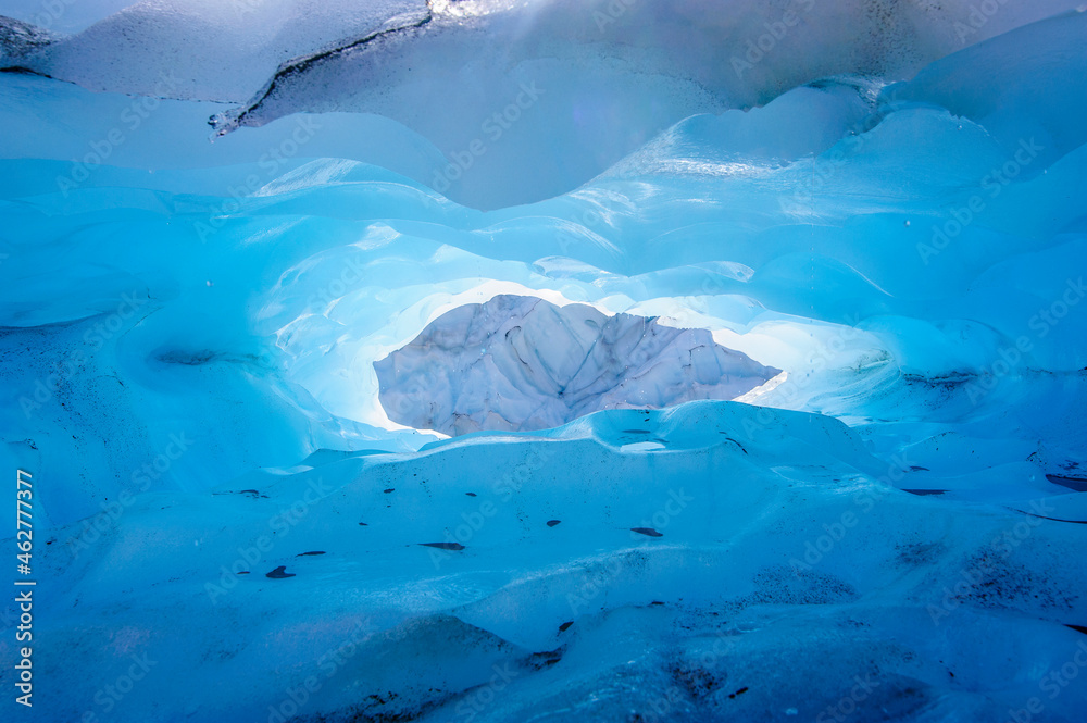 Blue ice in an ice cave in the Fox Glacier, South Island, New Zealand ...