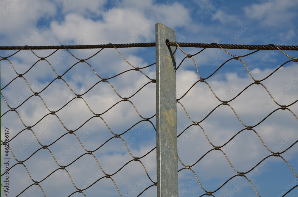 wire stainless steel net made of ropes connected by metal connectors as ...