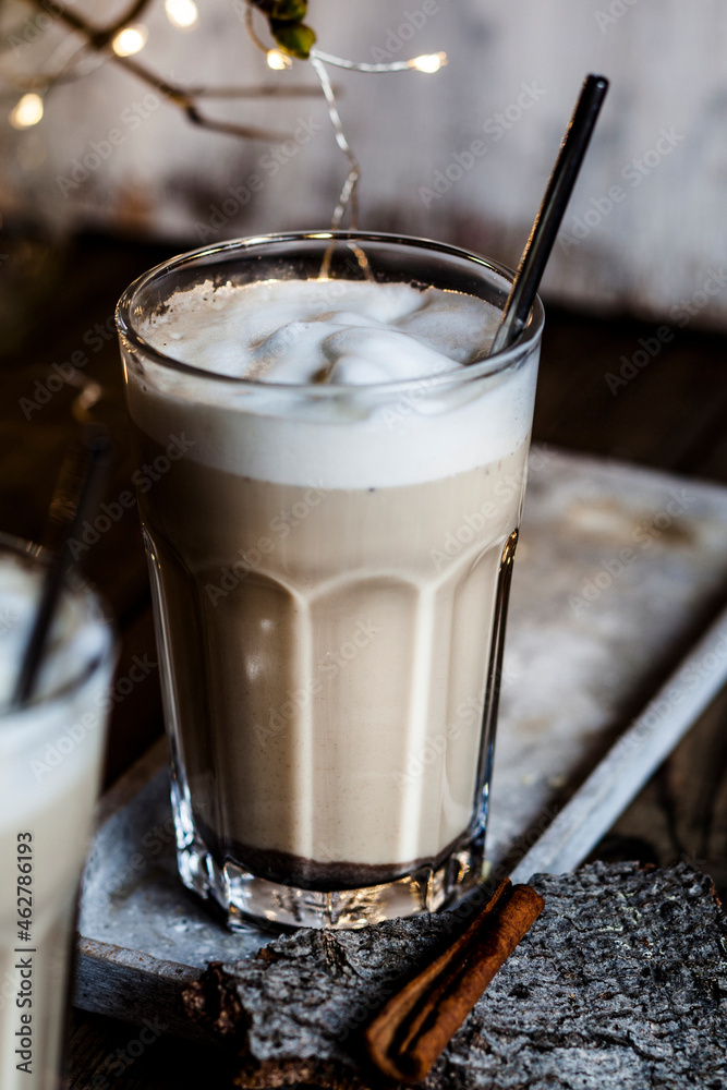 Glass of icedÔøΩchaiÔøΩwith frothy milk and cinnamon Stock Photo ...