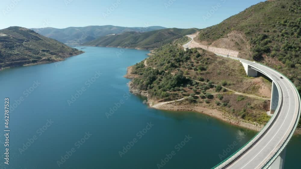 Aerial Of Car Driving At Ponte Sardao Over Sabor River With Mountainous ...