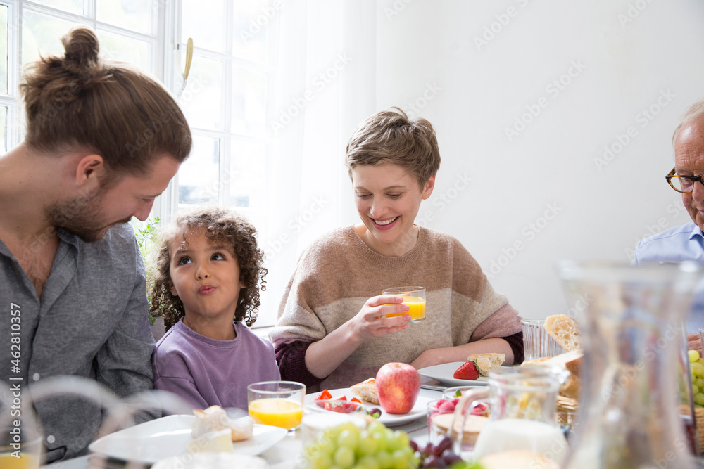 Extended family having lunch at home Stock Photo | Adobe Stock