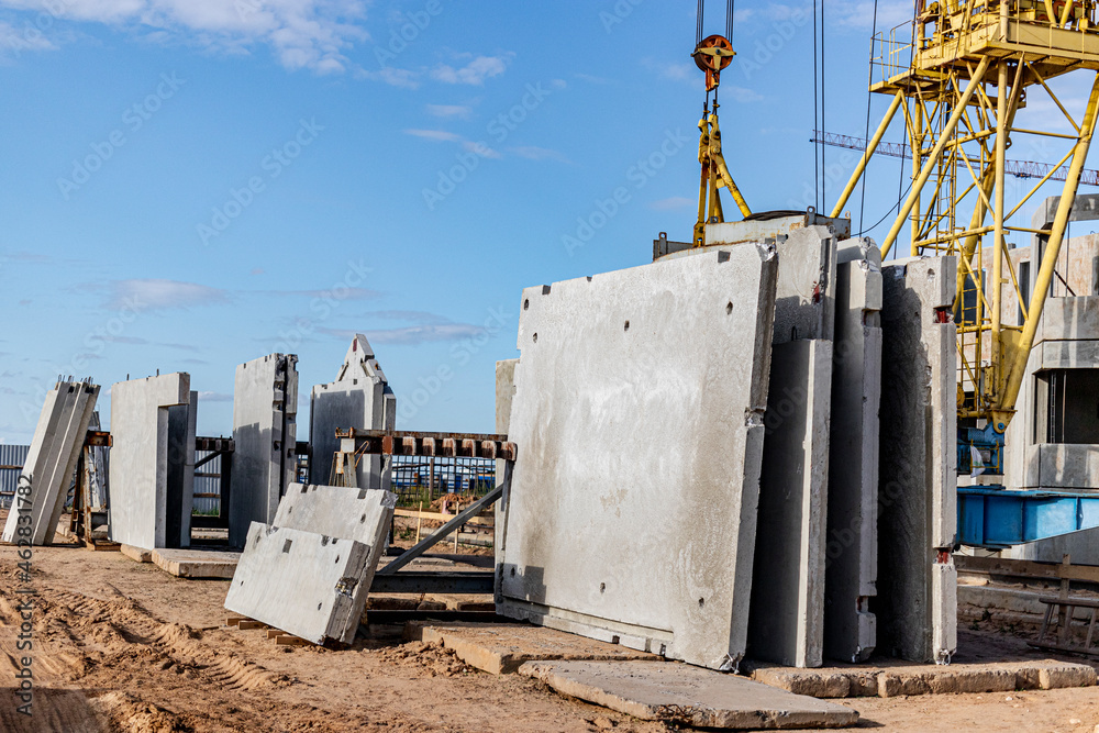 Many precast concrete wall panels are stocking in the storage area ...