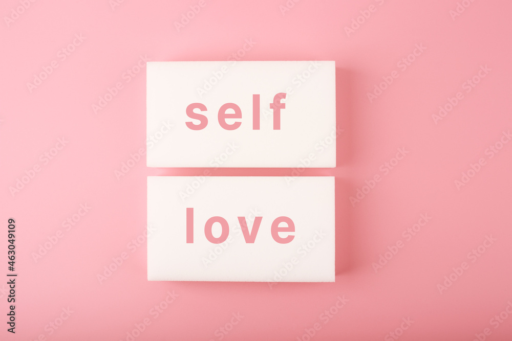 Self love minimal creative concept in pink colors against pink ...