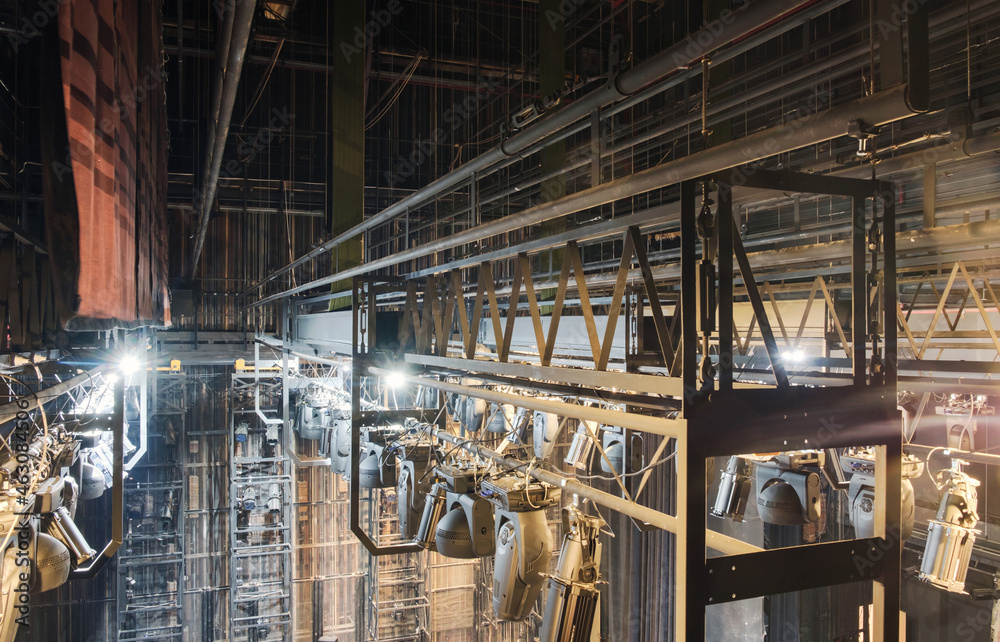 Technical equipment at the backstage of theater. Stage spot lighting ...