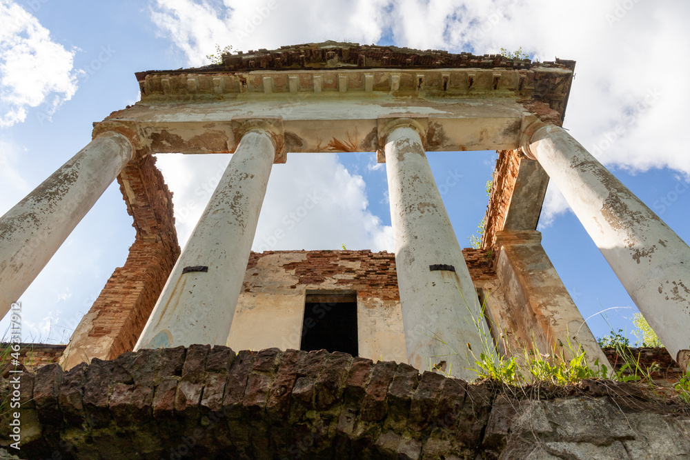 crumbling columns of a century-old palace against a blue sky Stock ...