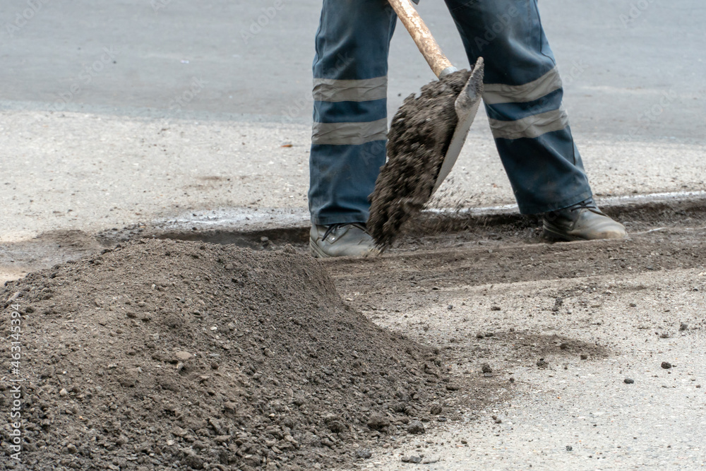 Repair of city roads and replacement of worn asphalt concrete pavement ...