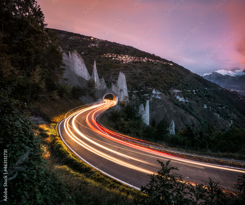 Light trails of traffic leading through tunnel. Stock Photo | Adobe Stock