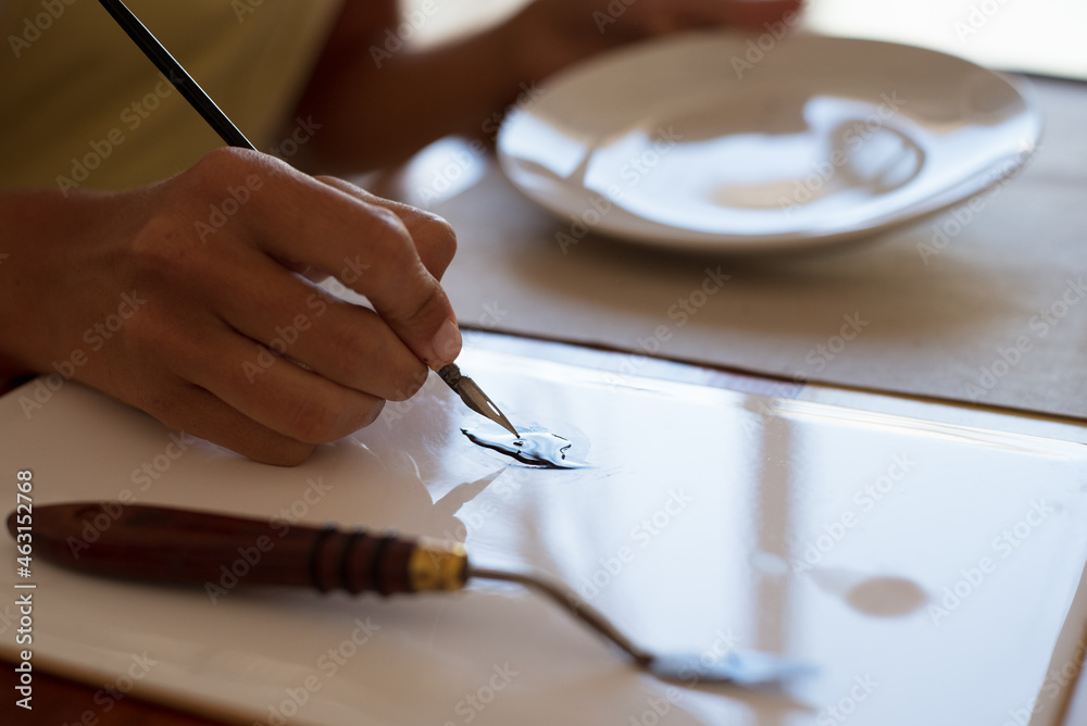 Hand and fountain pen touching the ink Stock Photo | Adobe Stock
