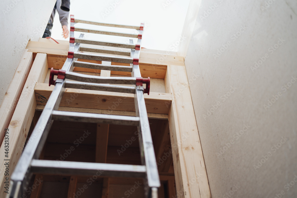 Extension ladder with integrated strap platform on site Stock Photo ...