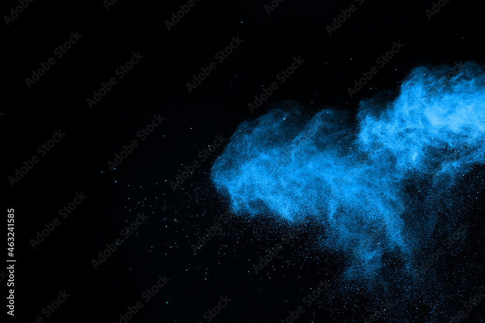 abstract blue powder splatted background,Freeze motion of color powder ...