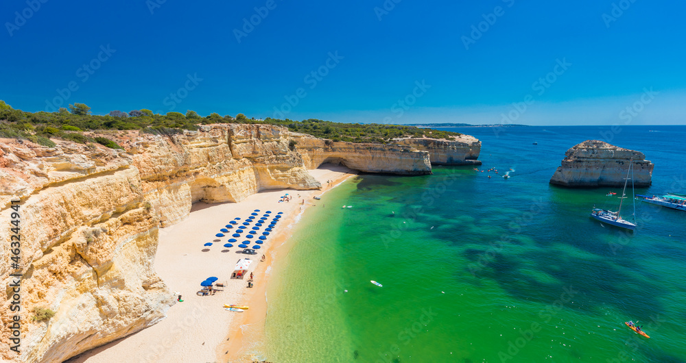 Aerial views of Praia da Marinha and Malhada do Baraco - beaches in ...