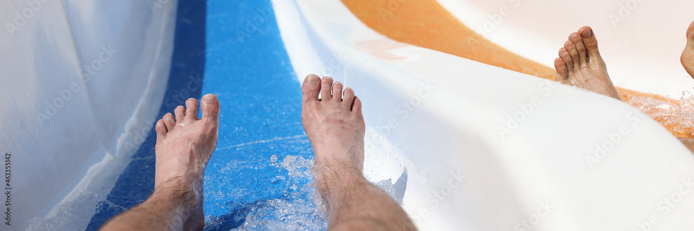 Male feet on slide in a water park while descending foto de Stock ...