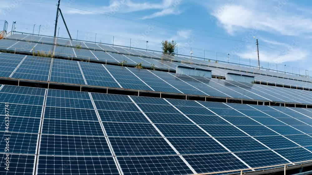 Photovoltaic infrared solar panels receiving photons from sun. Green ...