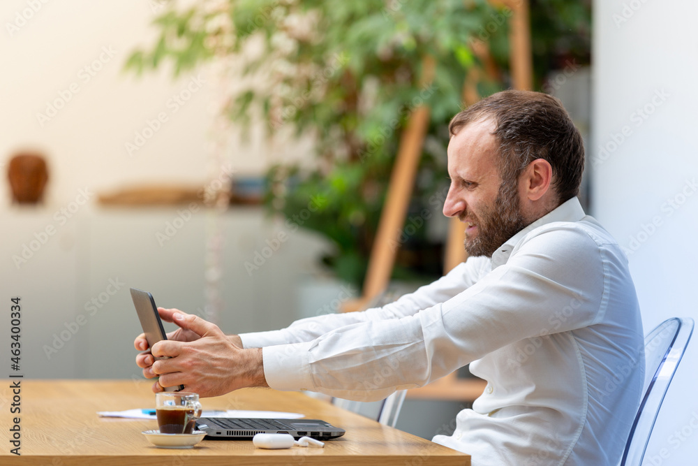 Angry and exhausted employee at home, smart working at home concepts ...