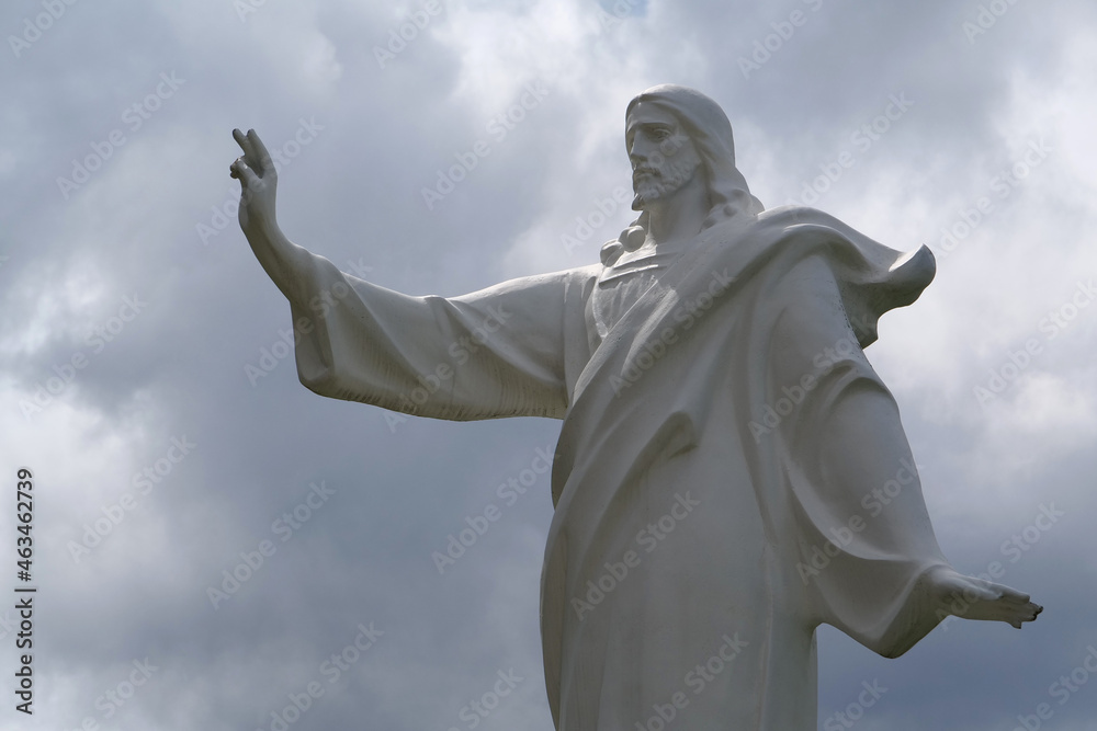 Jesus Christ with hand raised for blessing. Statue of Jesus of Nazareth ...