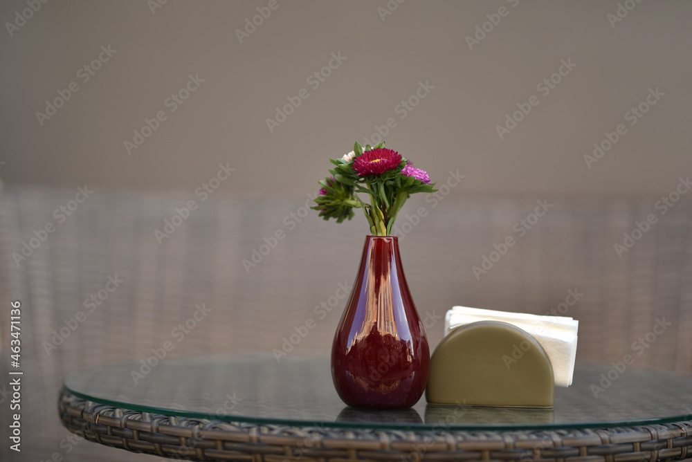 vase with flowers stand at round table of restaurant terrace Stock ...