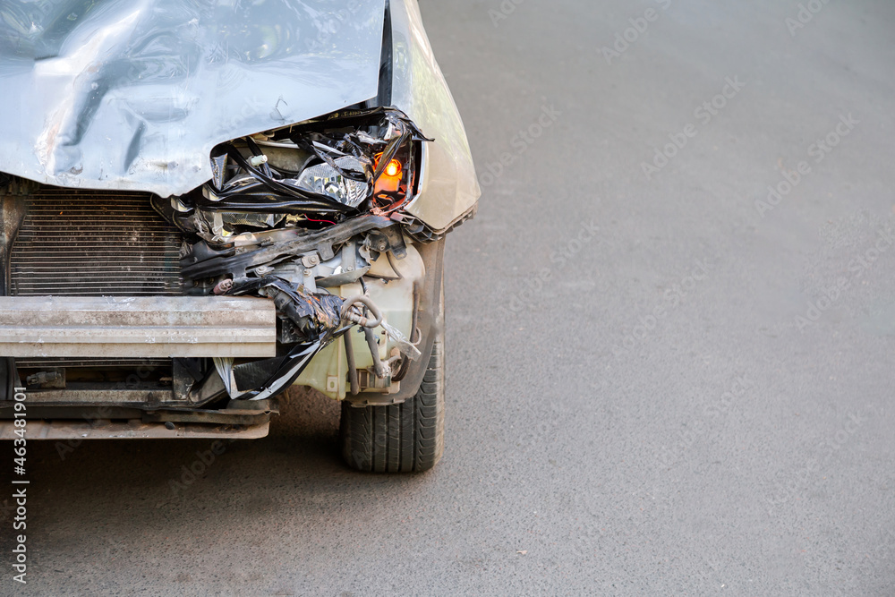 Broken hood of car on road after car accident with nobody copyspace ...