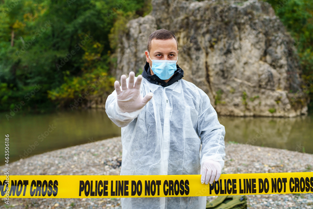 Front view portrait of police investigation forensic collecting ...