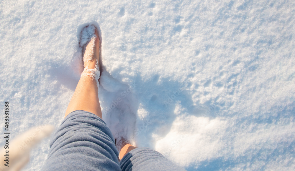 hardening for immunity walking barefoot in winter in the cold on white ...