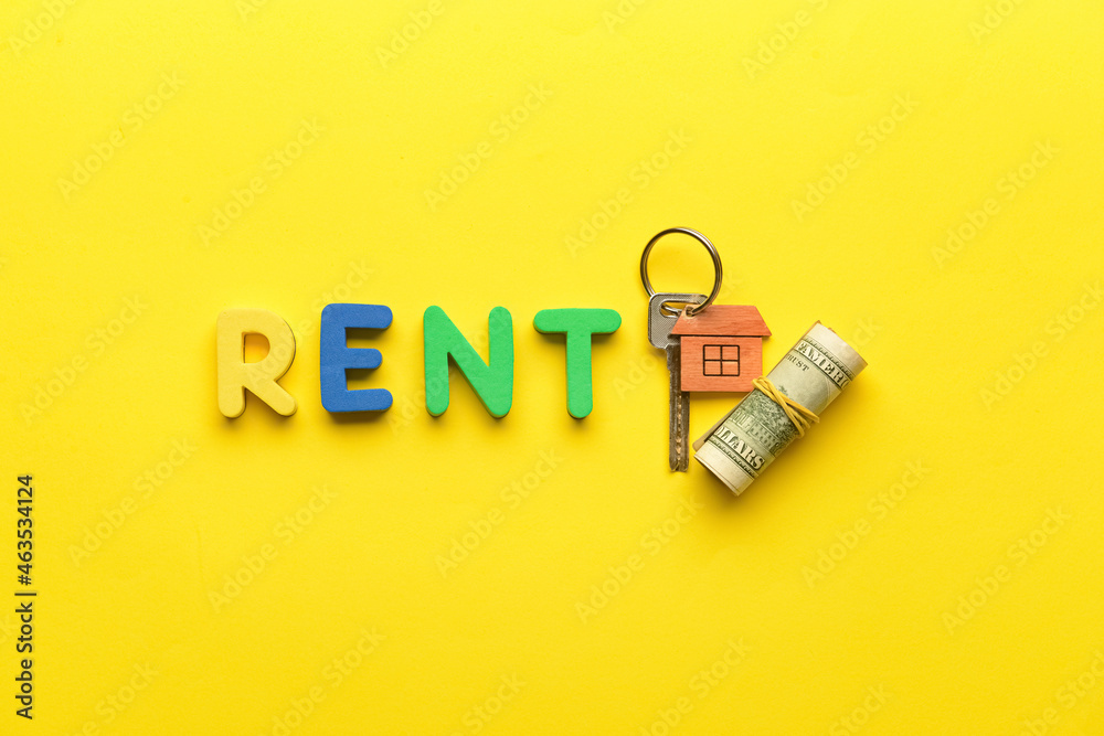 Word RENT with key from house and money on yellow background Stock ...