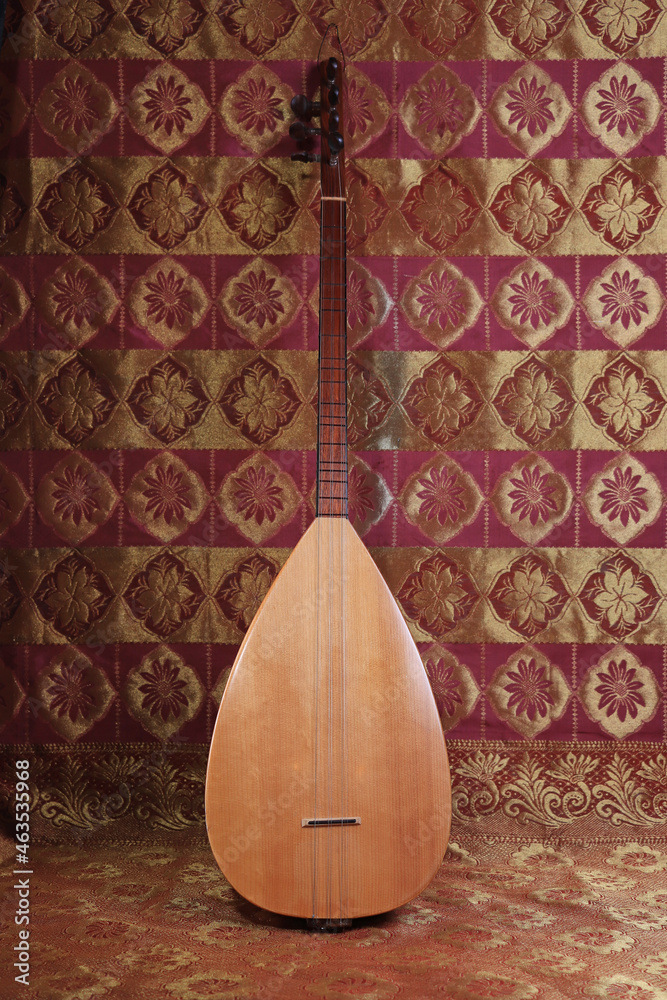 traditional Turkish national musical instrument baglama saz on a dark ...