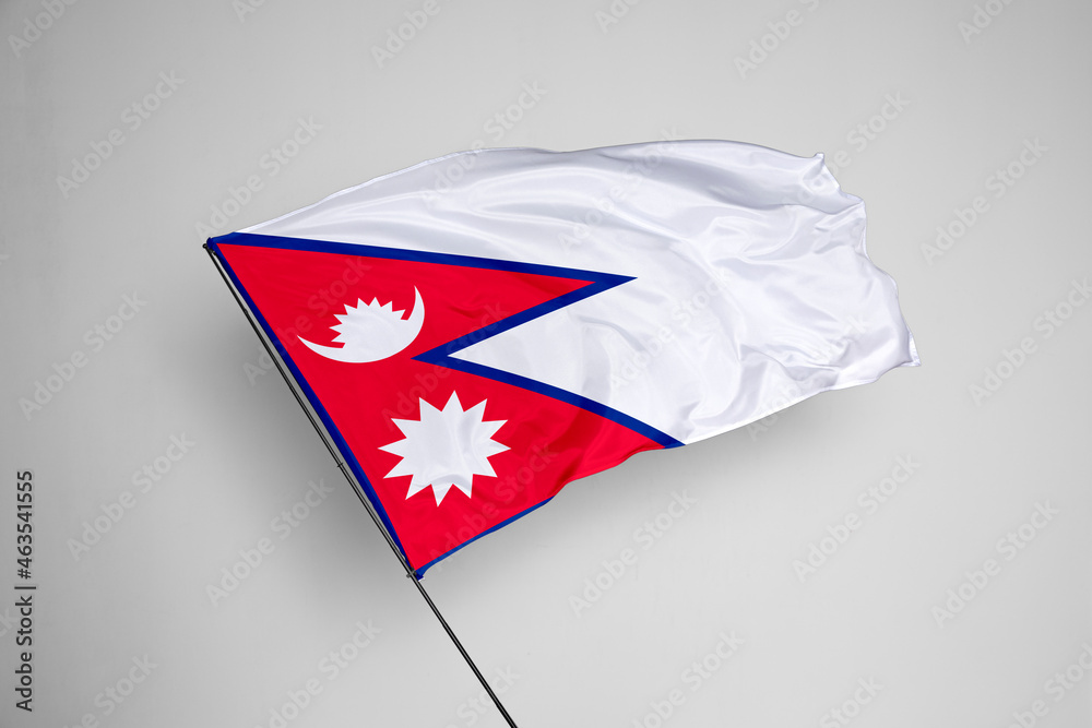 Nepal flag isolated on white background. close up waving flag of Nepal ...