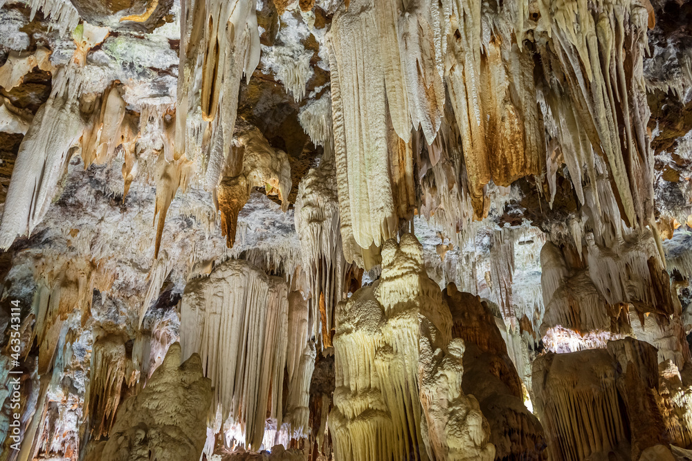 Geologic, Formation of stalactites and stalagmites inside an ancient ...