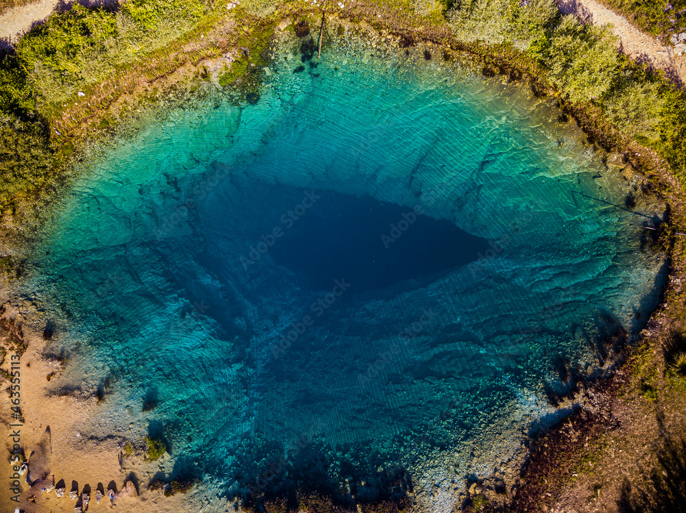 The spring of the Cetina River, izvor Cetine, in the foothills of the ...