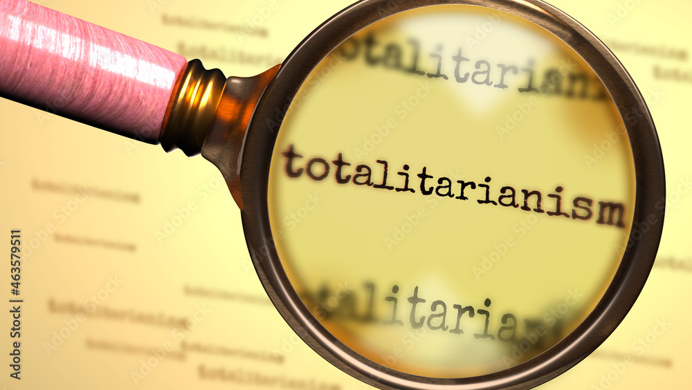Word Totalitarianism and a magnifying glass enlarging it to symbolize ...