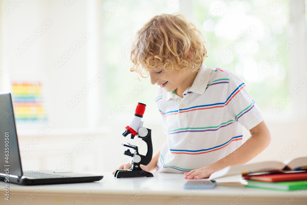 School kids with microscope. Science class. Stock Photo | Adobe Stock