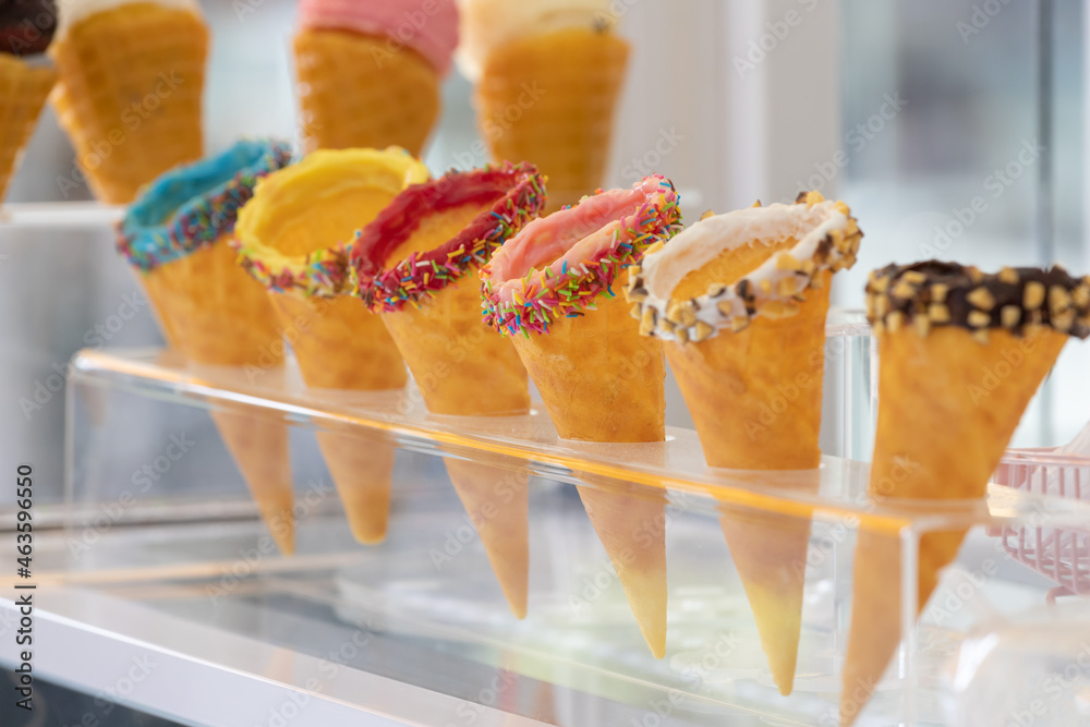 Ice cream cone on display of ice cream shop. Stock Photo | Adobe Stock