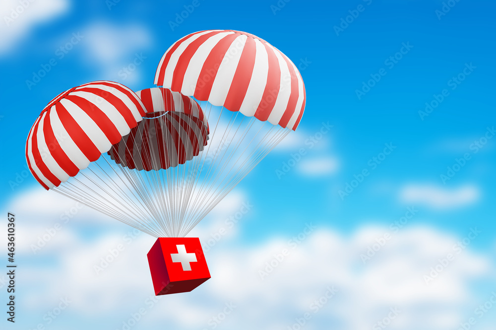 First aid kit falling with parachute. Concept - humanitarian aid ...