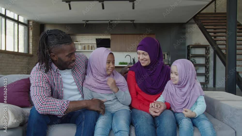Vidéo Stock Happy positive multiracial muslim family with two lovely ...
