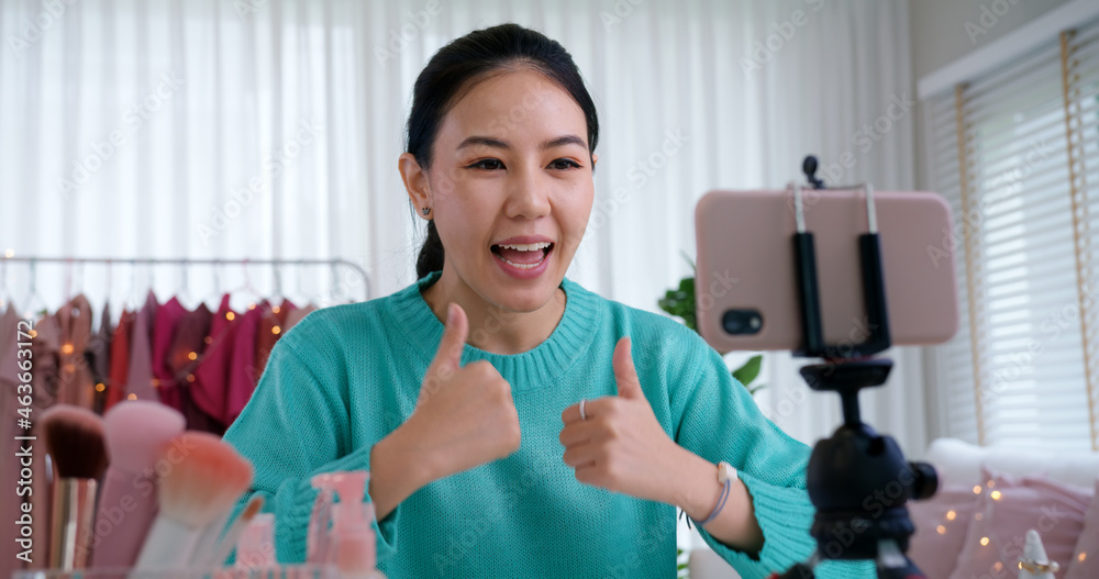 Asia woman micro influencer record live viral video camera at home ...