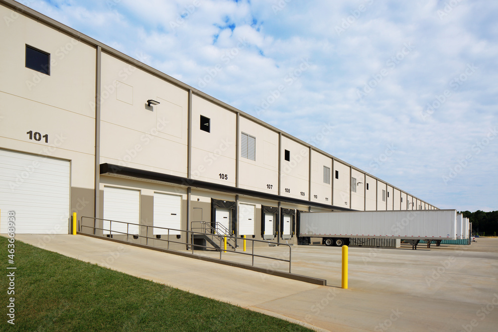 Side view of modern warehouse distribution facility Stock Photo | Adobe ...