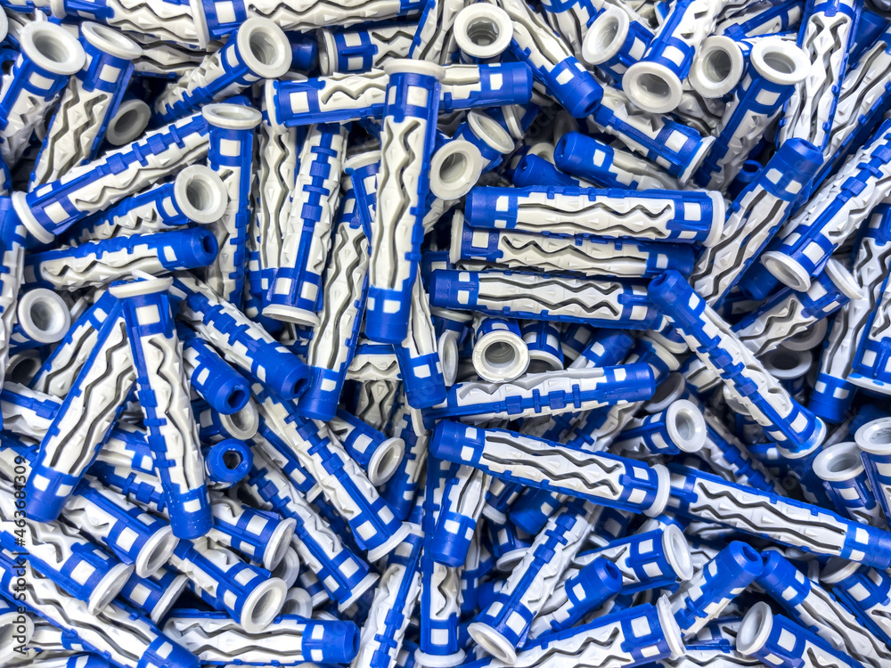 Blue and white wall plugs - do-it-yourself background and texture - top ...