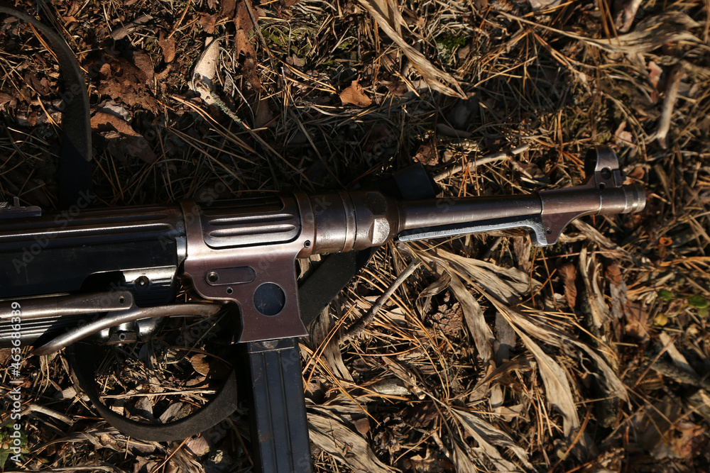 Vintage machine gun on the ground Stock Photo | Adobe Stock