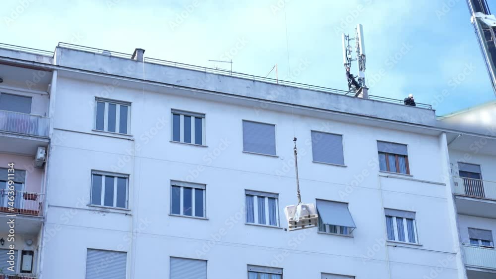 Construction crane lifting signal transmitter equipments on the top of ...