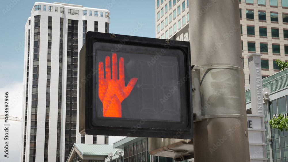 Urban City pedestrian crosswalk safety sign signal with bright orange ...
