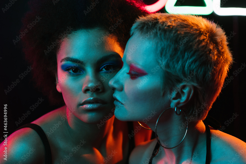 Sensual models in neon Stock Photo | Adobe Stock