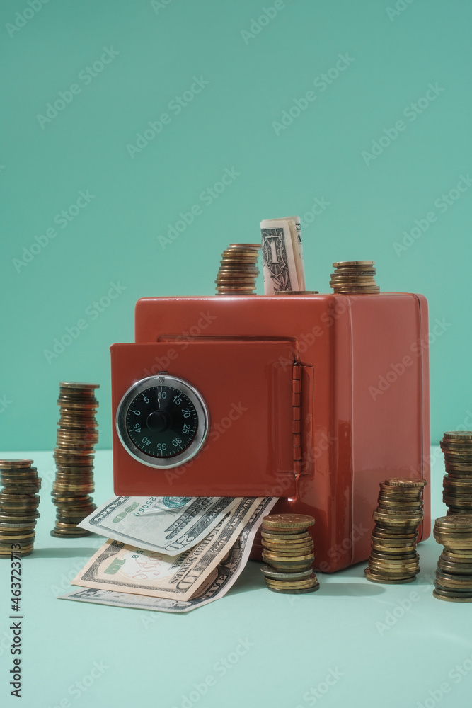 Money Safe Box With Dollar Bills And Coins Stock Photo | Adobe Stock