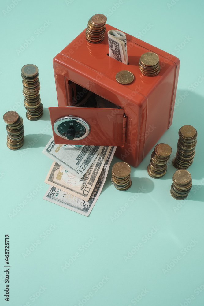 Red Money Safe Box With Dollar Bills And Euro Coins Stock Photo | Adobe ...